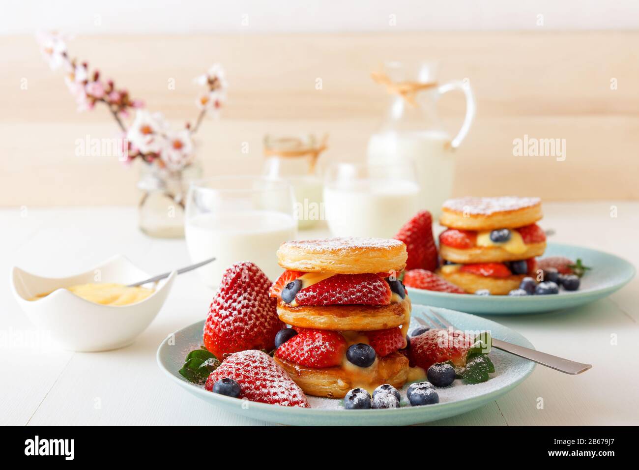 Mille Feuille, puff pastry discs with giant strawberries and ...