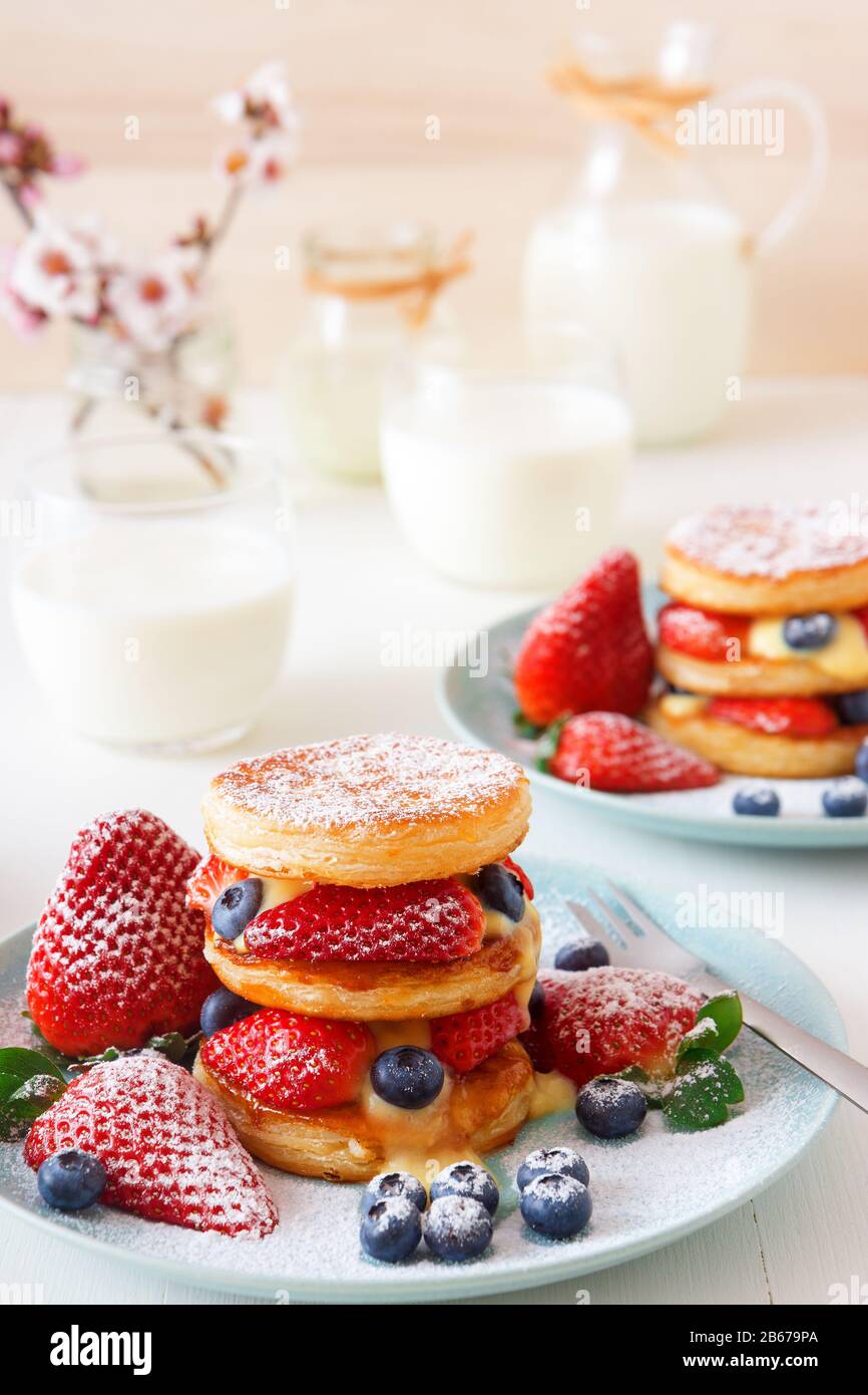 Mille Feuille, puff pastry discs with giant strawberries and ...