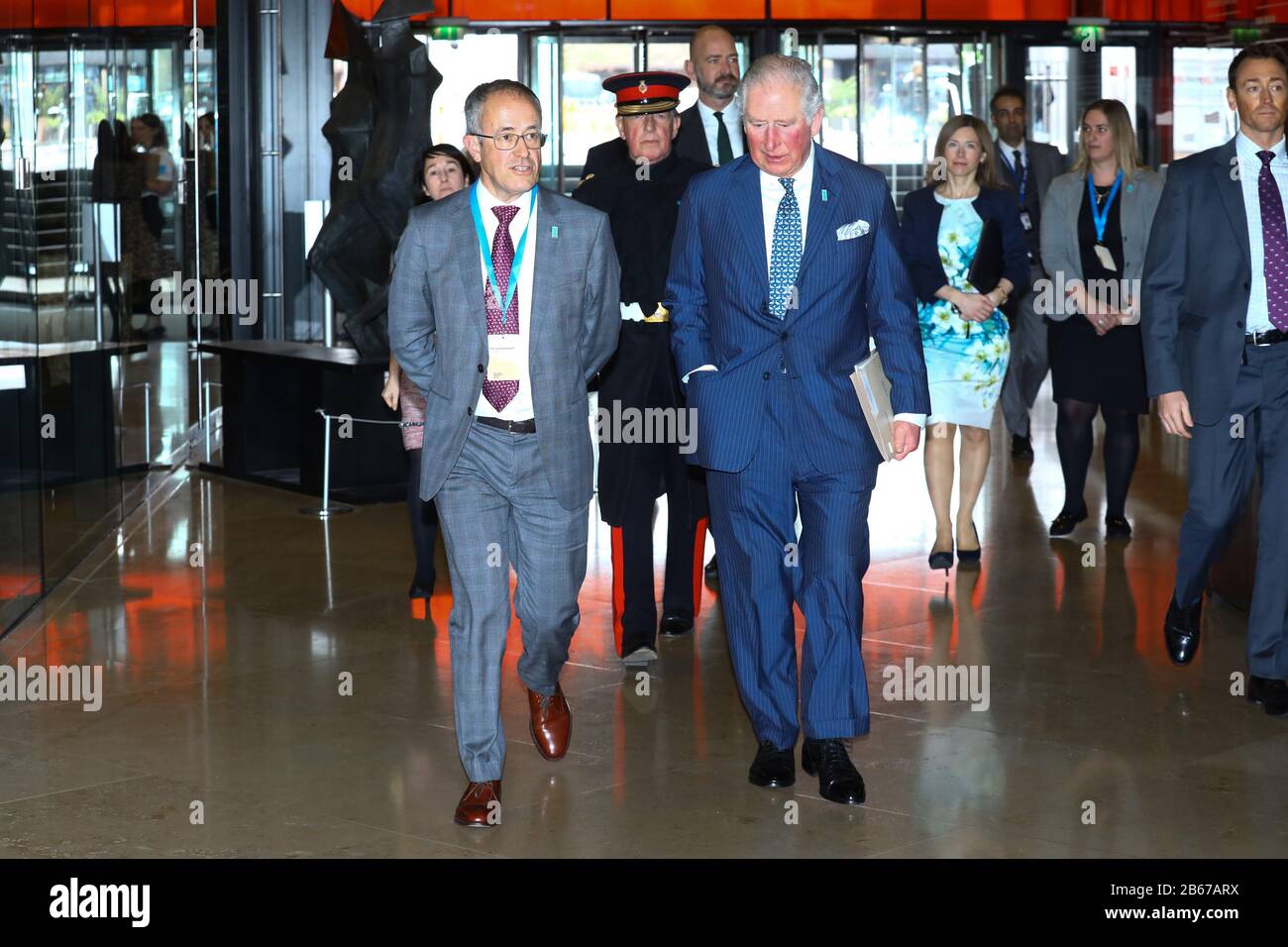 The Prince of Wales and Tim Wainwright from WaterAid (left) attend the ...