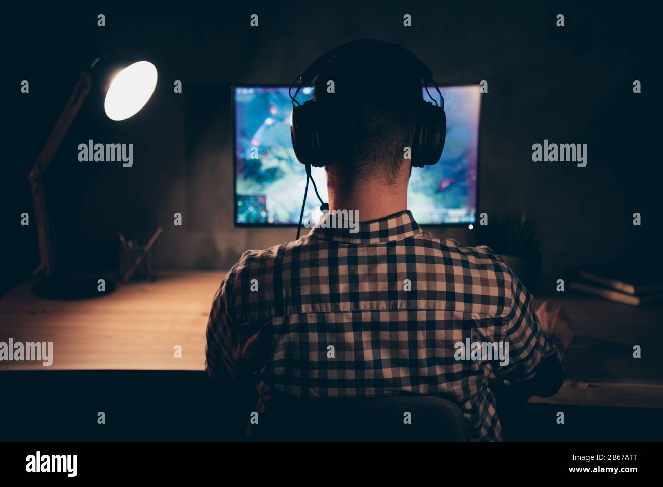 Close up back rear behind view photo he him his guy play videogame ...