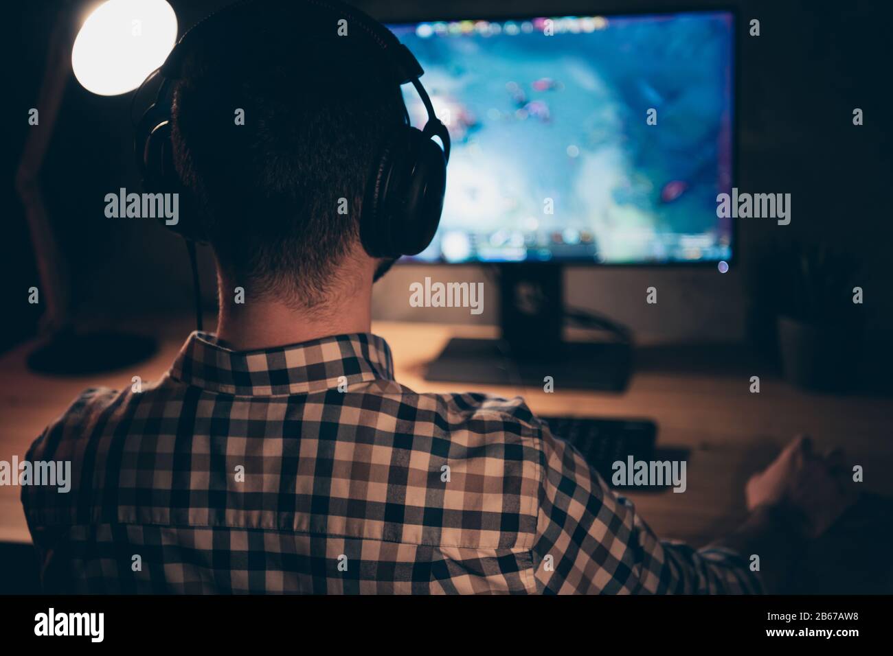 Close up back rear behind view photo he him his guy play videogame ...