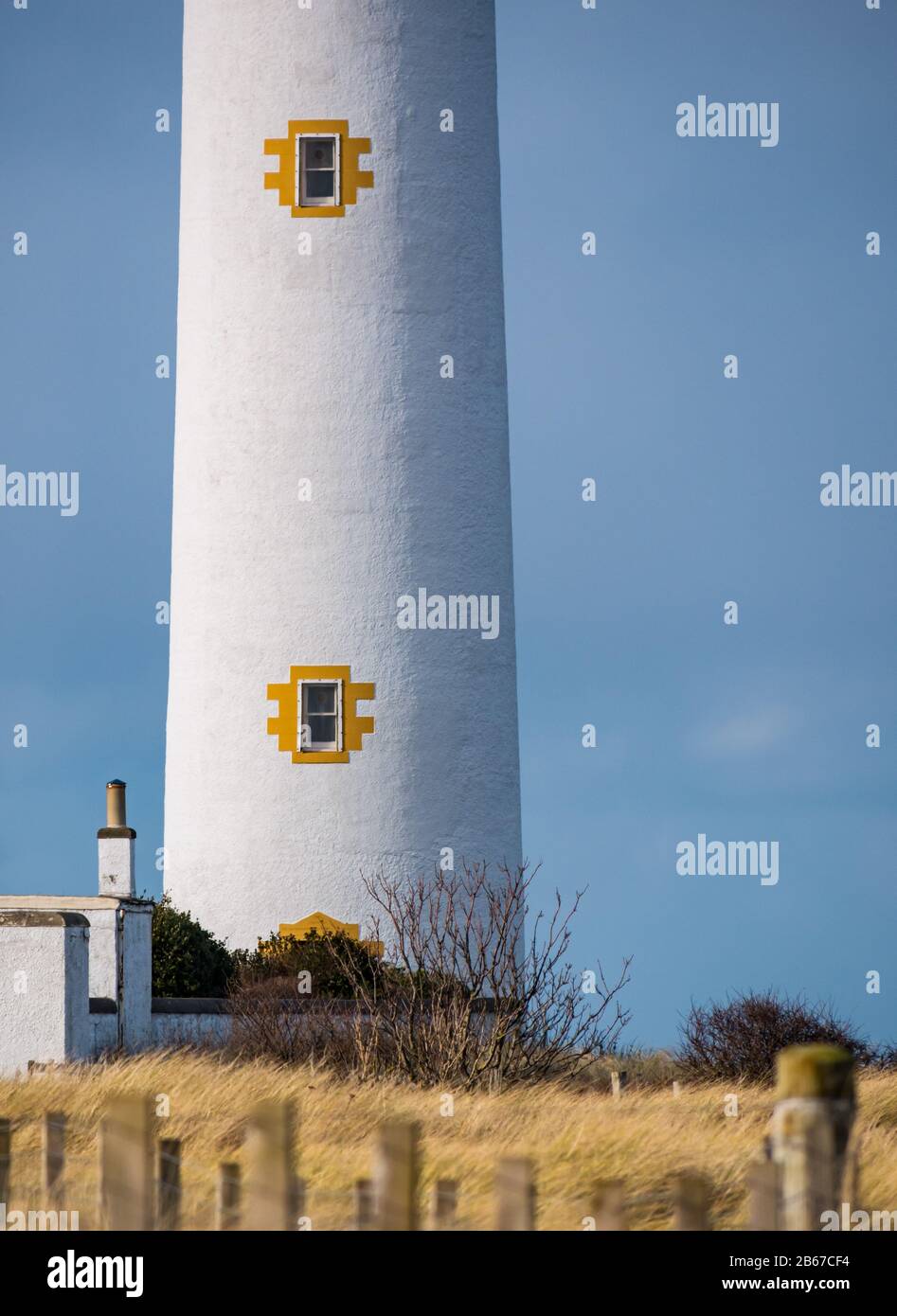 Deactivated Stevenson lighthouse tower in sunshine, Barns Ness, East ...