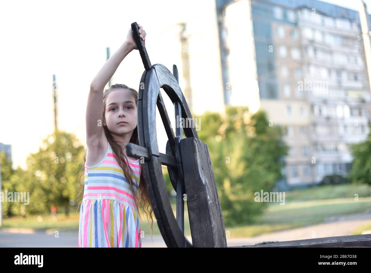 Portrait of a cute little girl nine years old. Girl 9 years old in the summer Stock Photo - Alamy