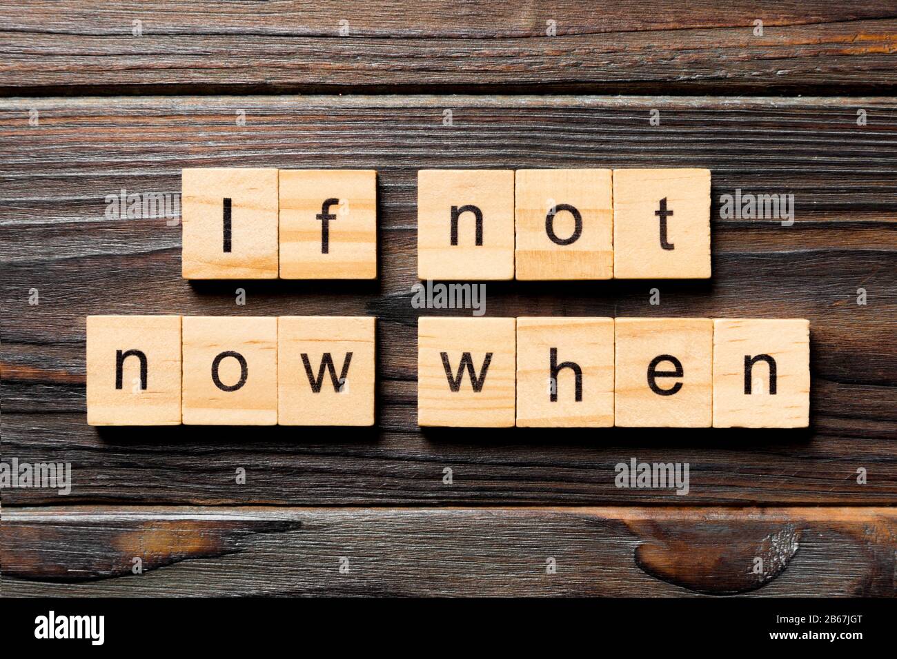 If not now when word written on wood block. If not now when text on ...