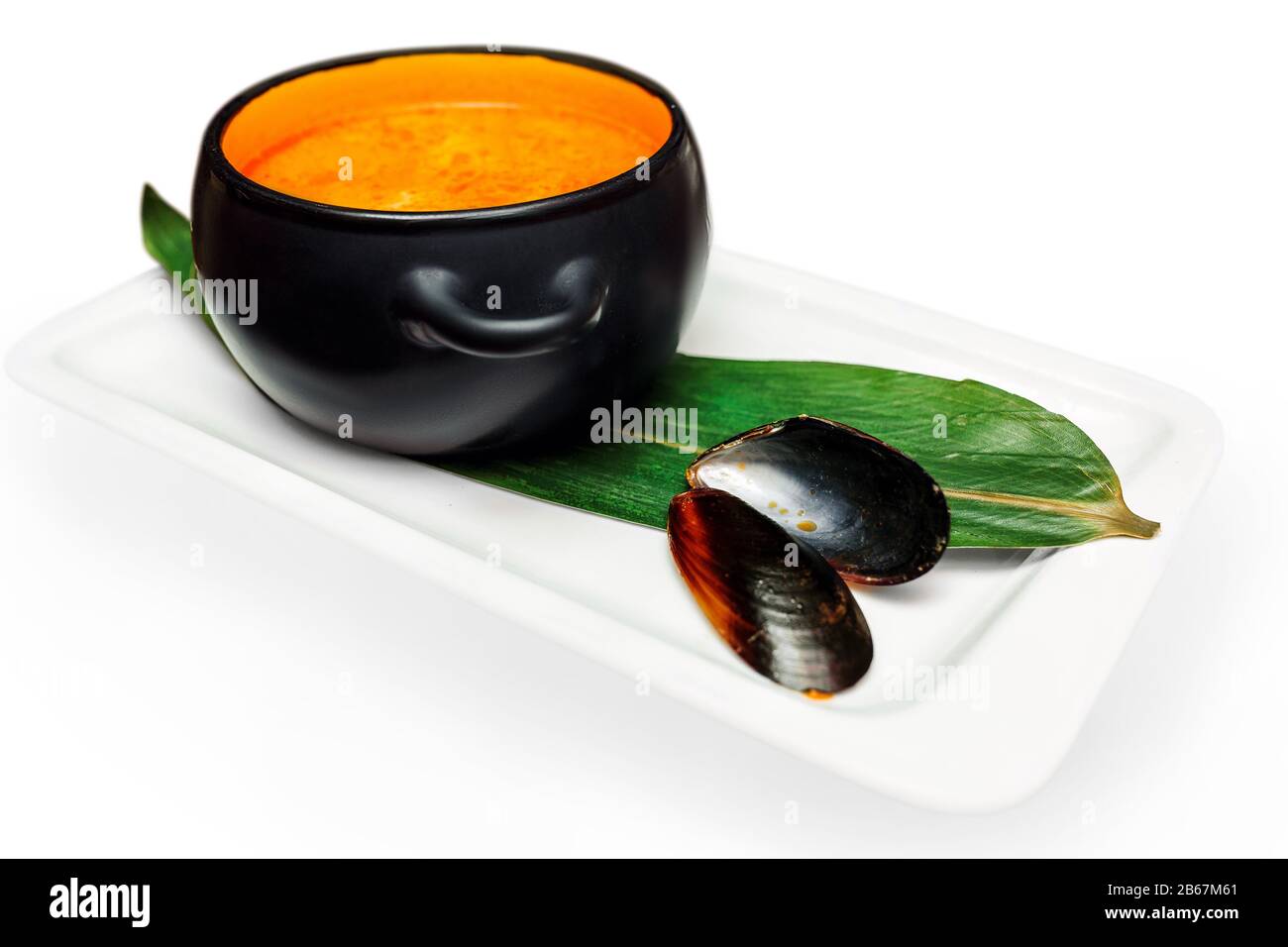 popular Thai Tom Yum Kung with mussel shell isolated on white Stock ...
