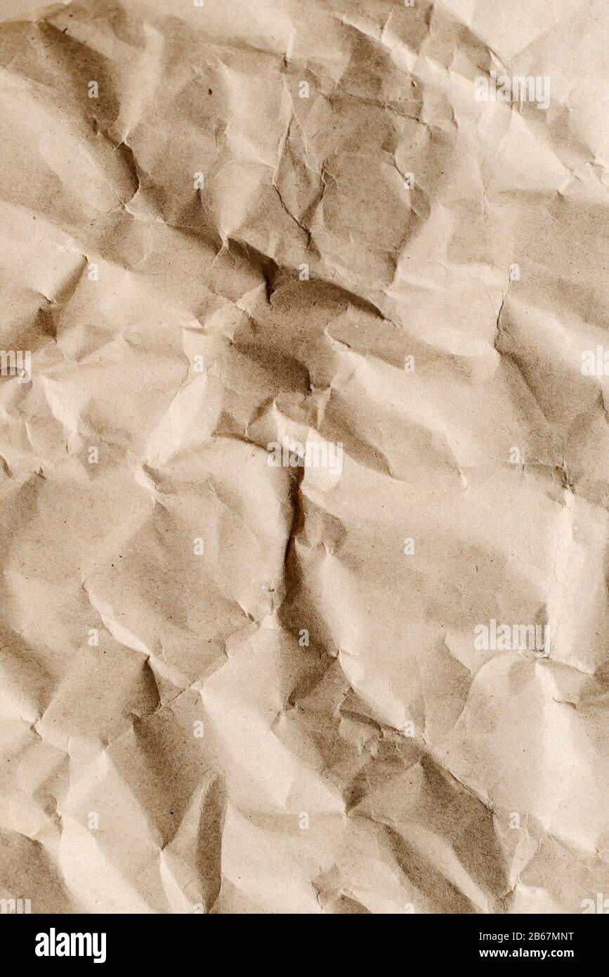 Crumpled craft paper texture. Folds on rough texture paper Stock Photo ...