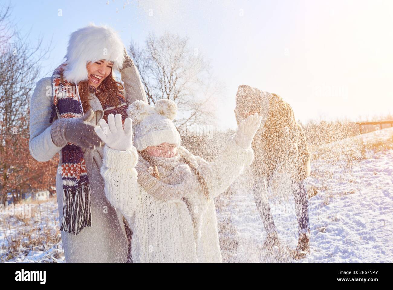 Snowball fight father daughter hi-res stock photography and images - Alamy