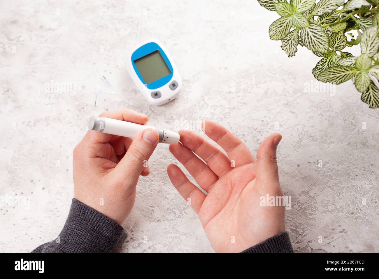 Diabetes finger glucose meter hi-res stock photography and images - Alamy