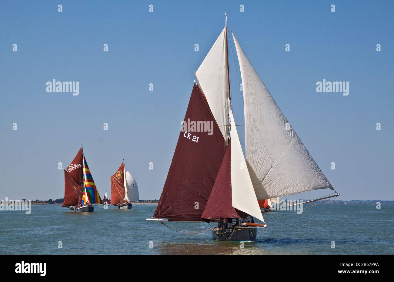 Essex sailing smack CK21 Maria and other smacks in full sail Stock ...