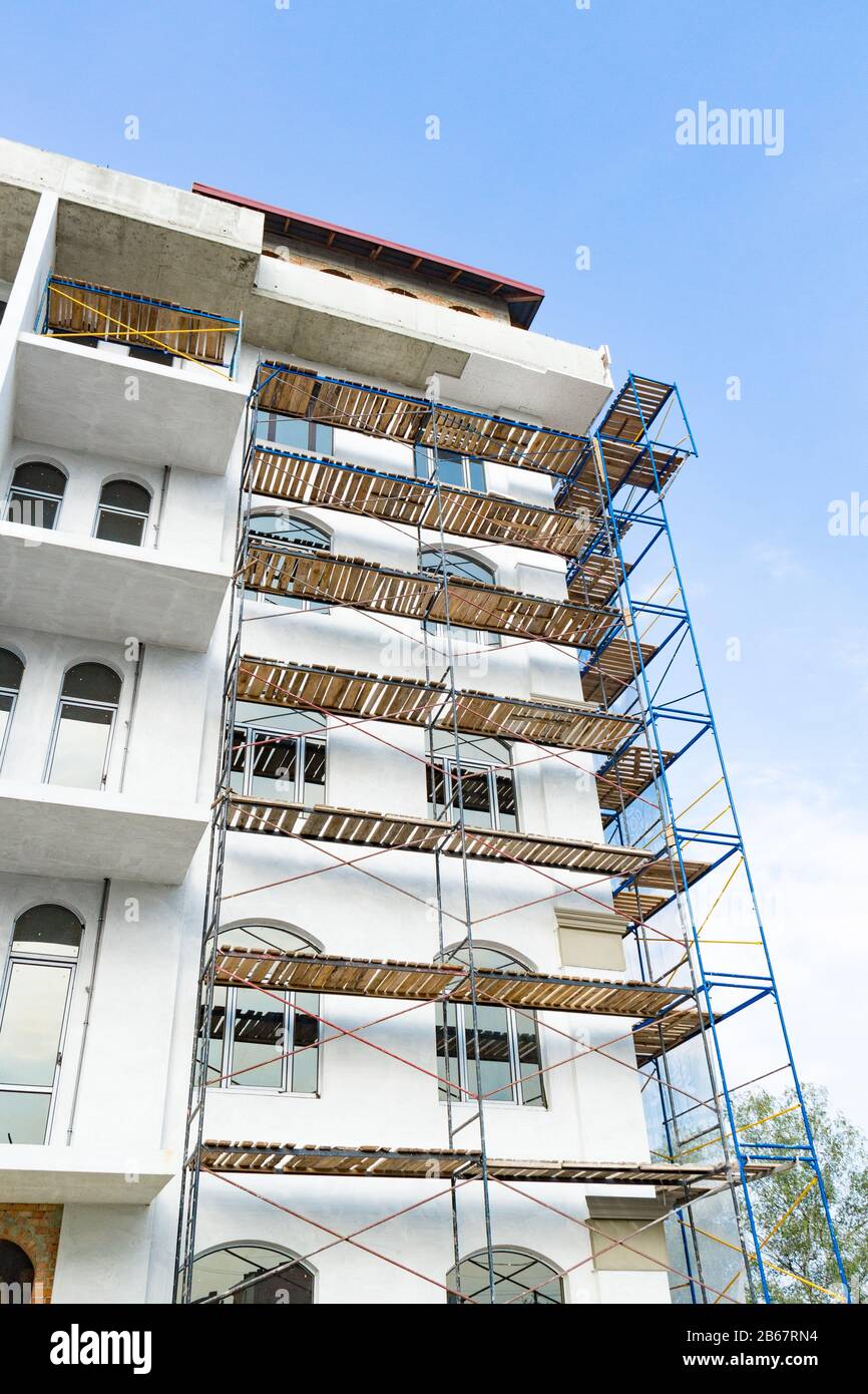 Extensive scaffolding for building a new house. Constraction of ...