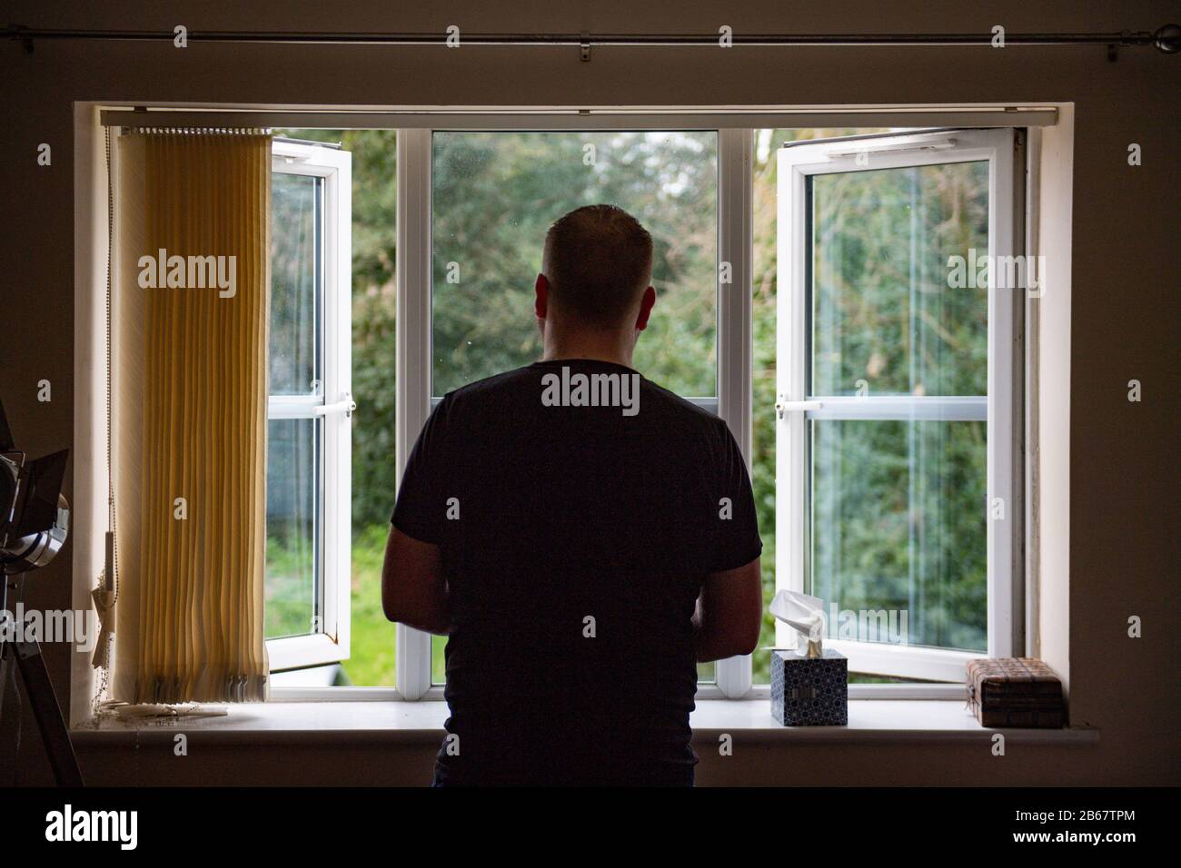 Picture posed by model to illustrate self-isolating measures. People ...