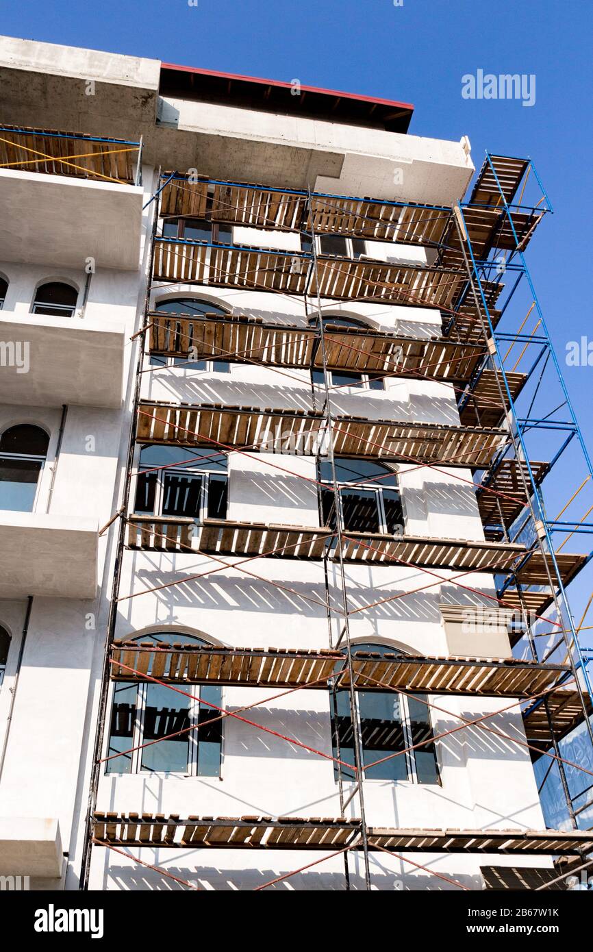 Extensive scaffolding for building a new house. Constraction of ...