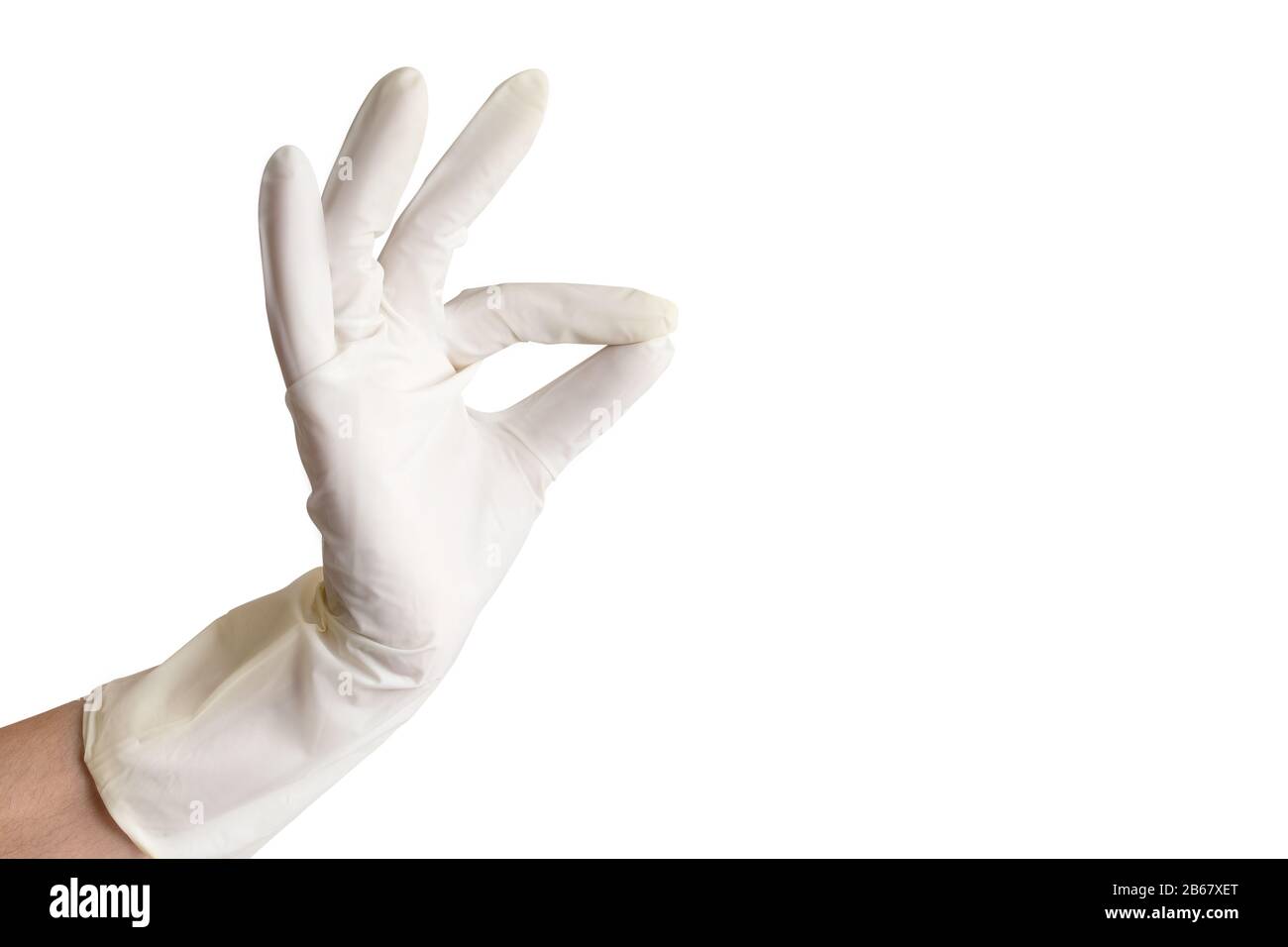 Hand wearing white rubber glove making a gesture okay Stock Photo - Alamy