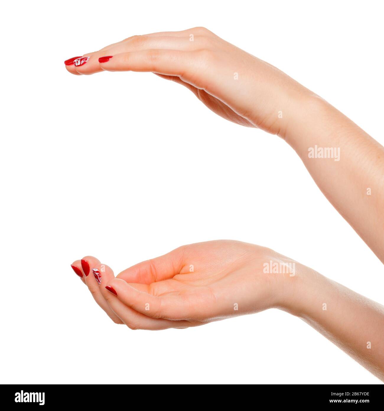Close-up of beautiful woman's hands, palms up. Isolated on white ...