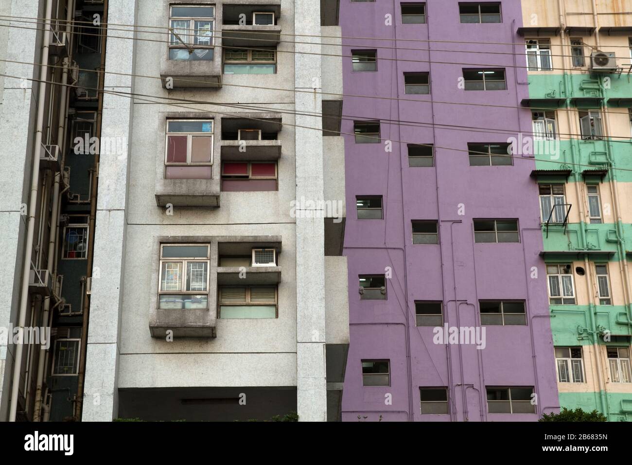Painted Facade of housing block in Hong Kong Stock Photo - Alamy