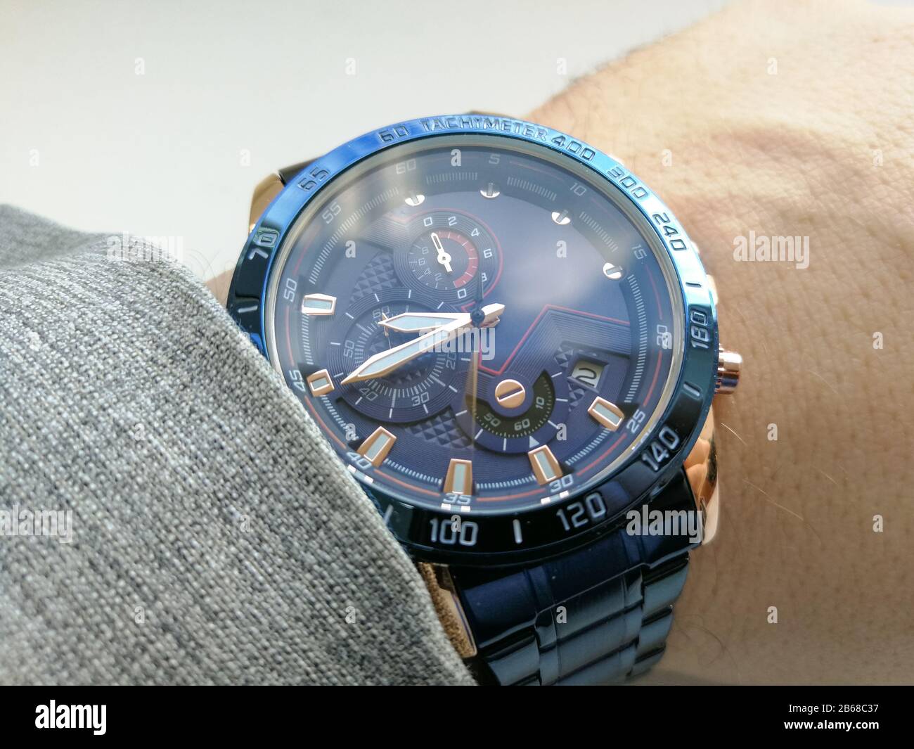 Professional luxury blue watch on businessman hand Stock Photo - Alamy