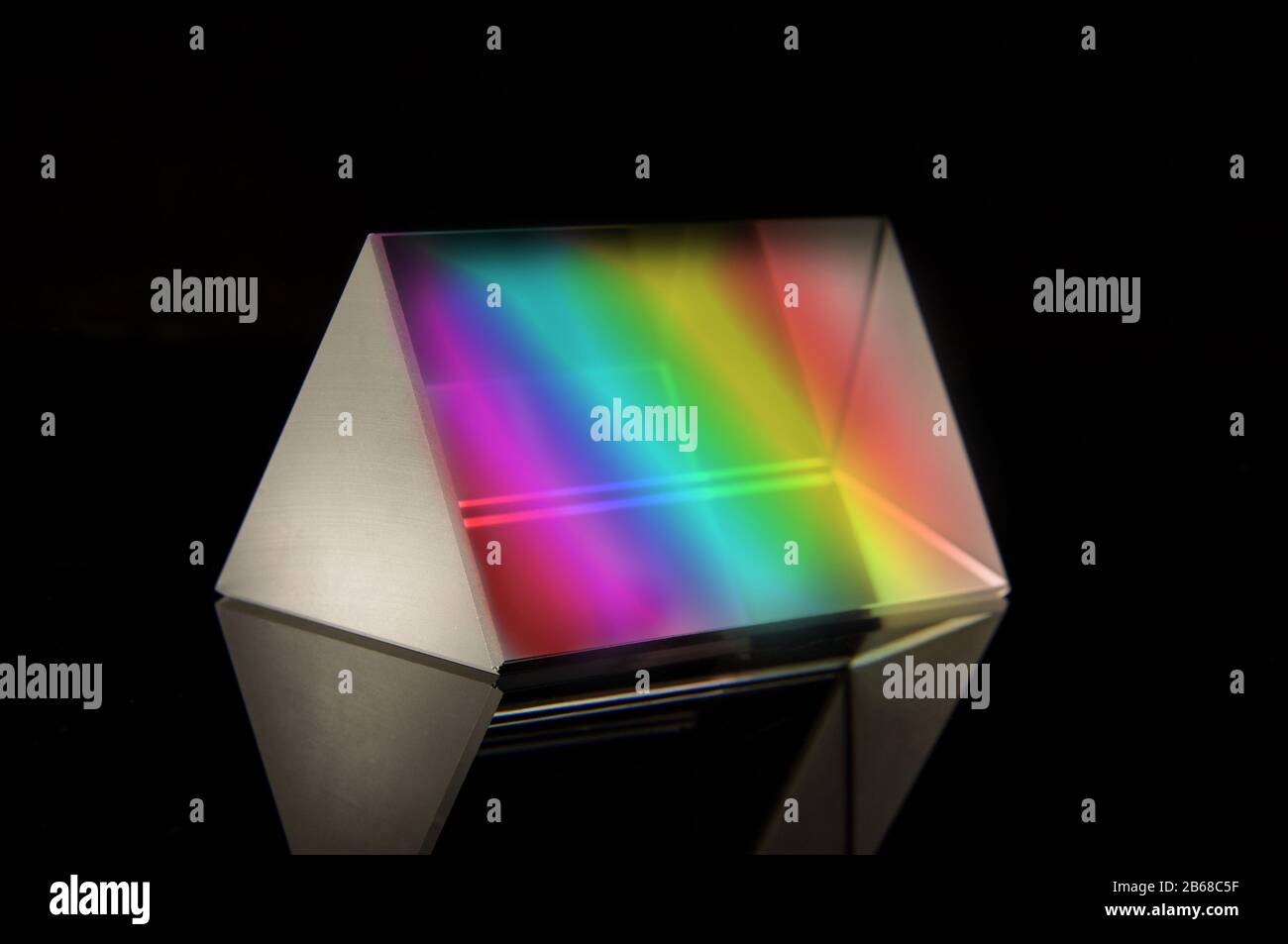 Triangular optical prism for scientific experiments isolated on the ...