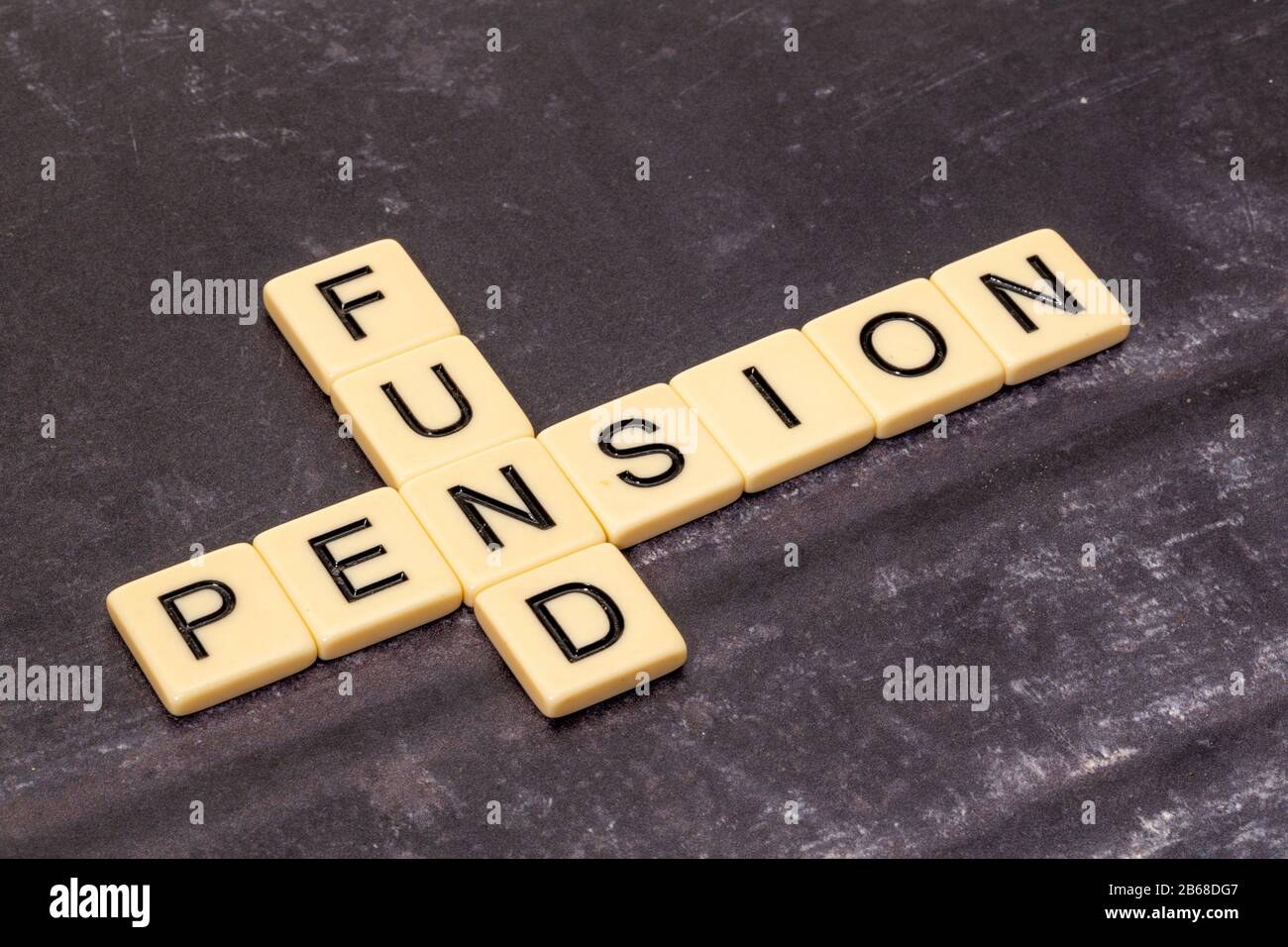 Word Game letters spelling out the words, Pension Fund Stock Photo - Alamy
