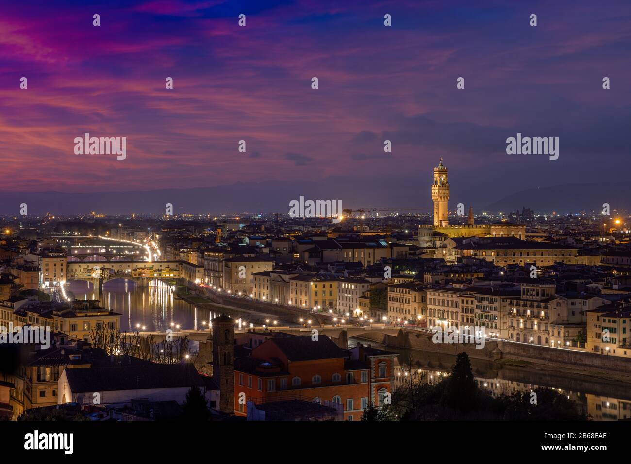 Florence illuminated view from Piazzale Michelangelo at sunset Stock ...