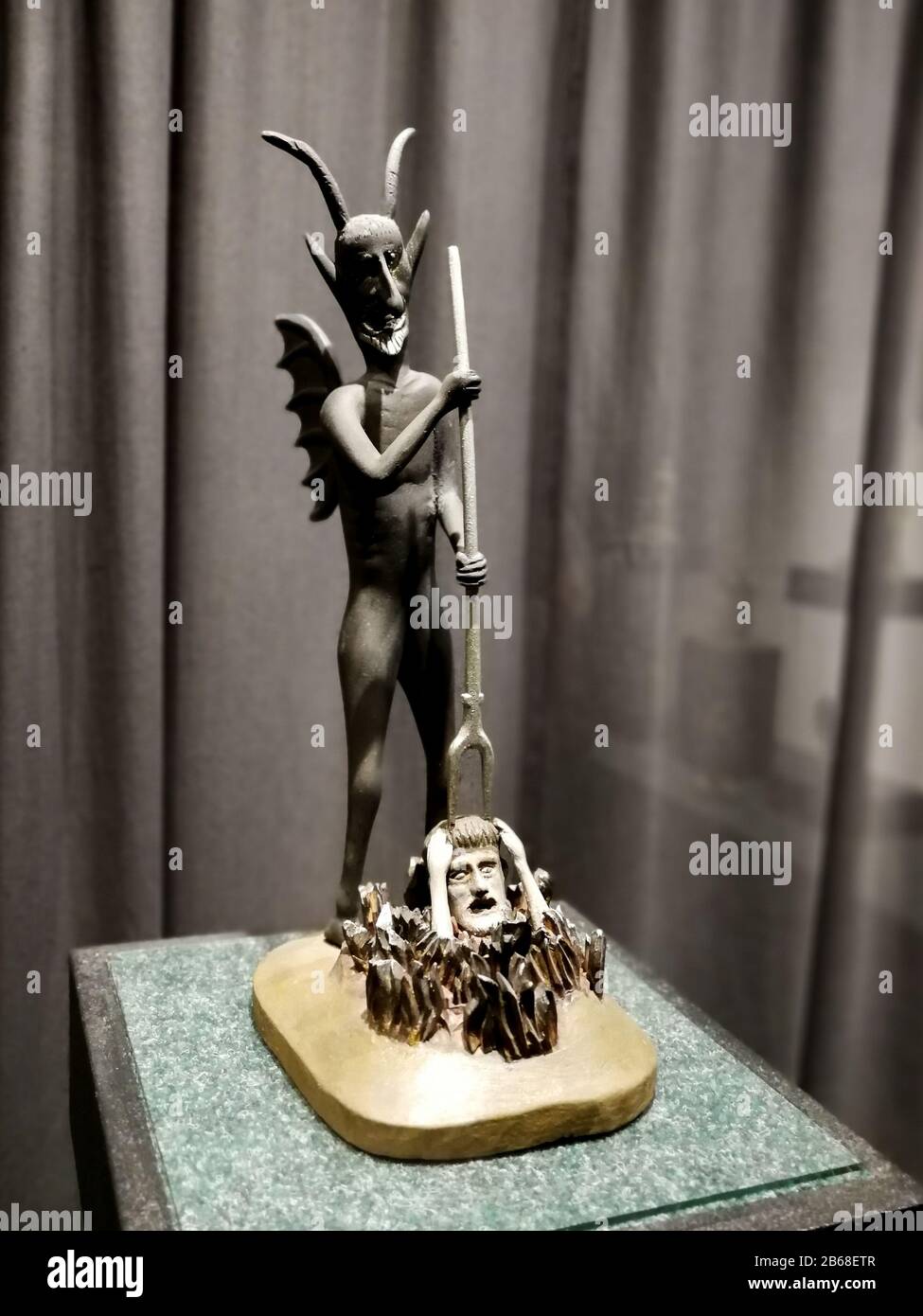 KAUNAS, LITHUANIA - APRIL 08, 2015: Symbolic devil sculpture artwork in ...