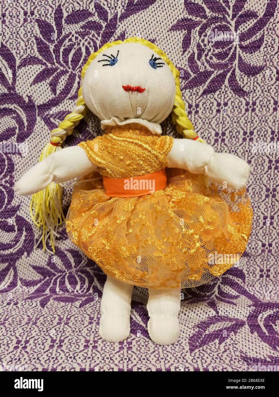 Handcraft cute vintage doll with golden hair Stock Photo - Alamy