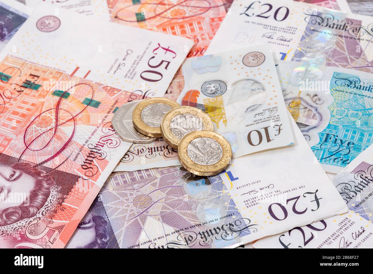 UK coins and banknote background Stock Photo - Alamy
