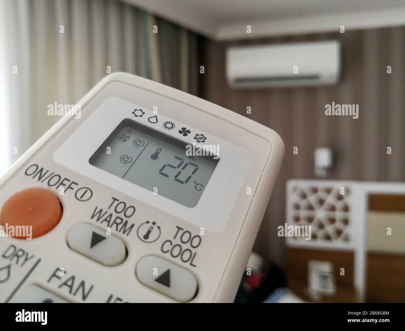 Remote control setting temperature for air conditioner on the wall ...