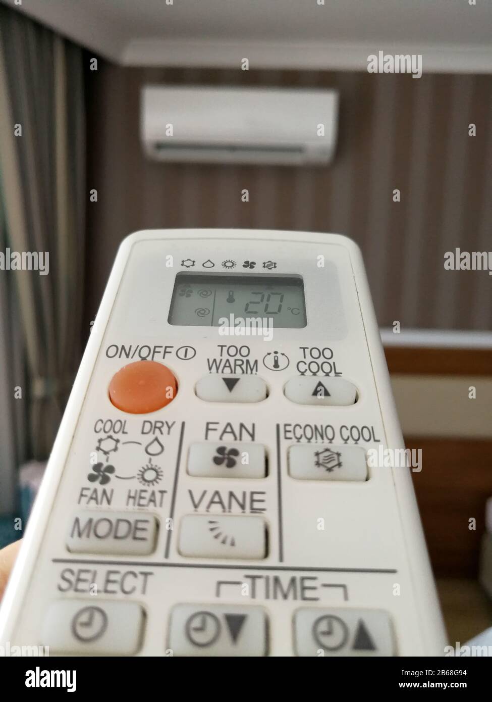 Remote control setting temperature for air conditioner on the wall ...