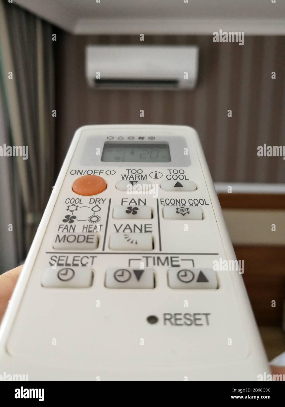 Remote control setting temperature for air conditioner on the wall ...