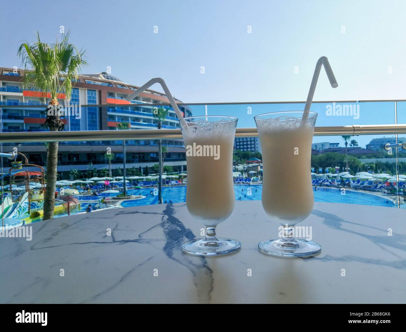 Pina colada alcoholic cocktail on a luxury hotel bar table Stock Photo ...