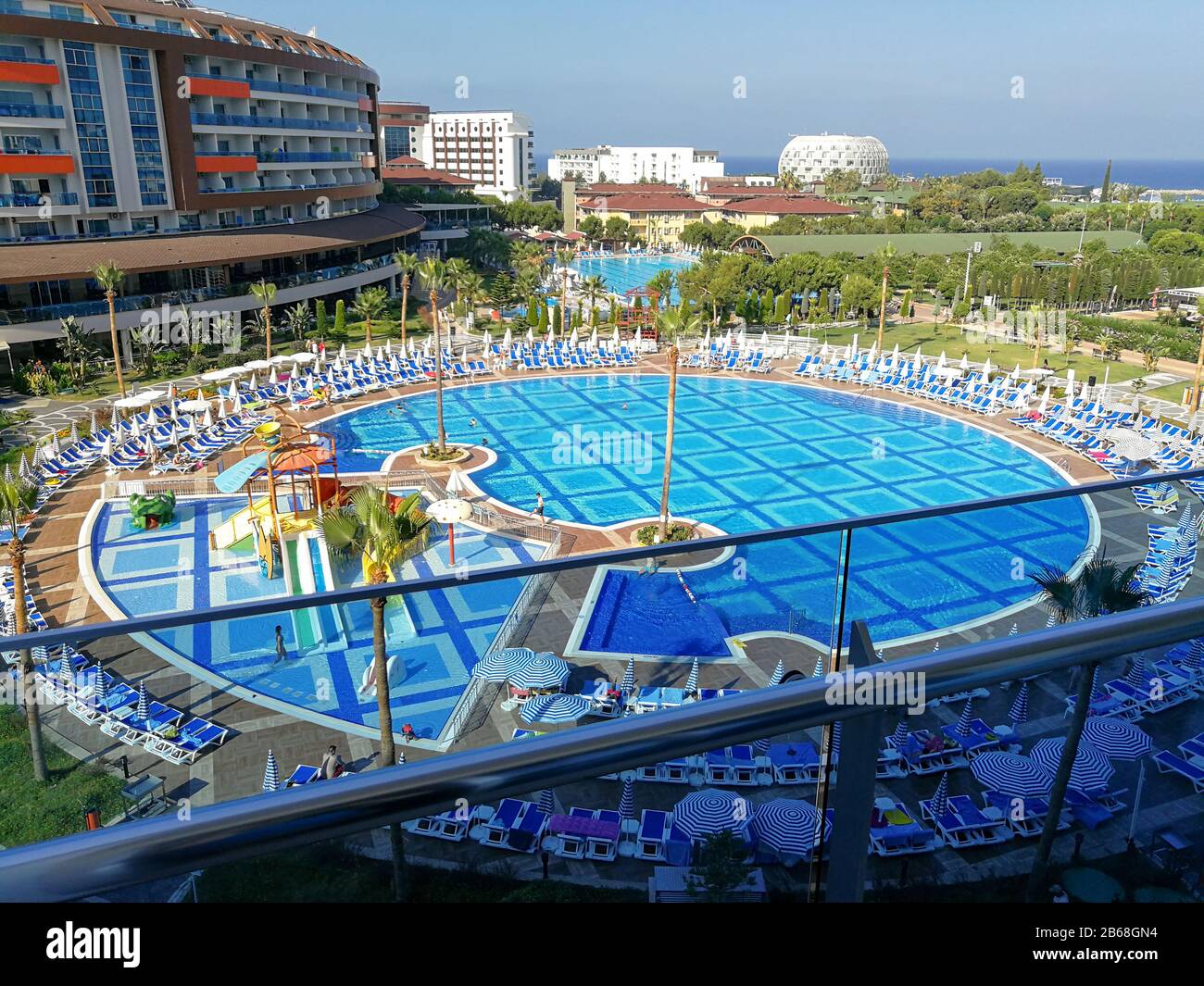 Big and luxury swimming pool of the hotel view from hotel balcony ...