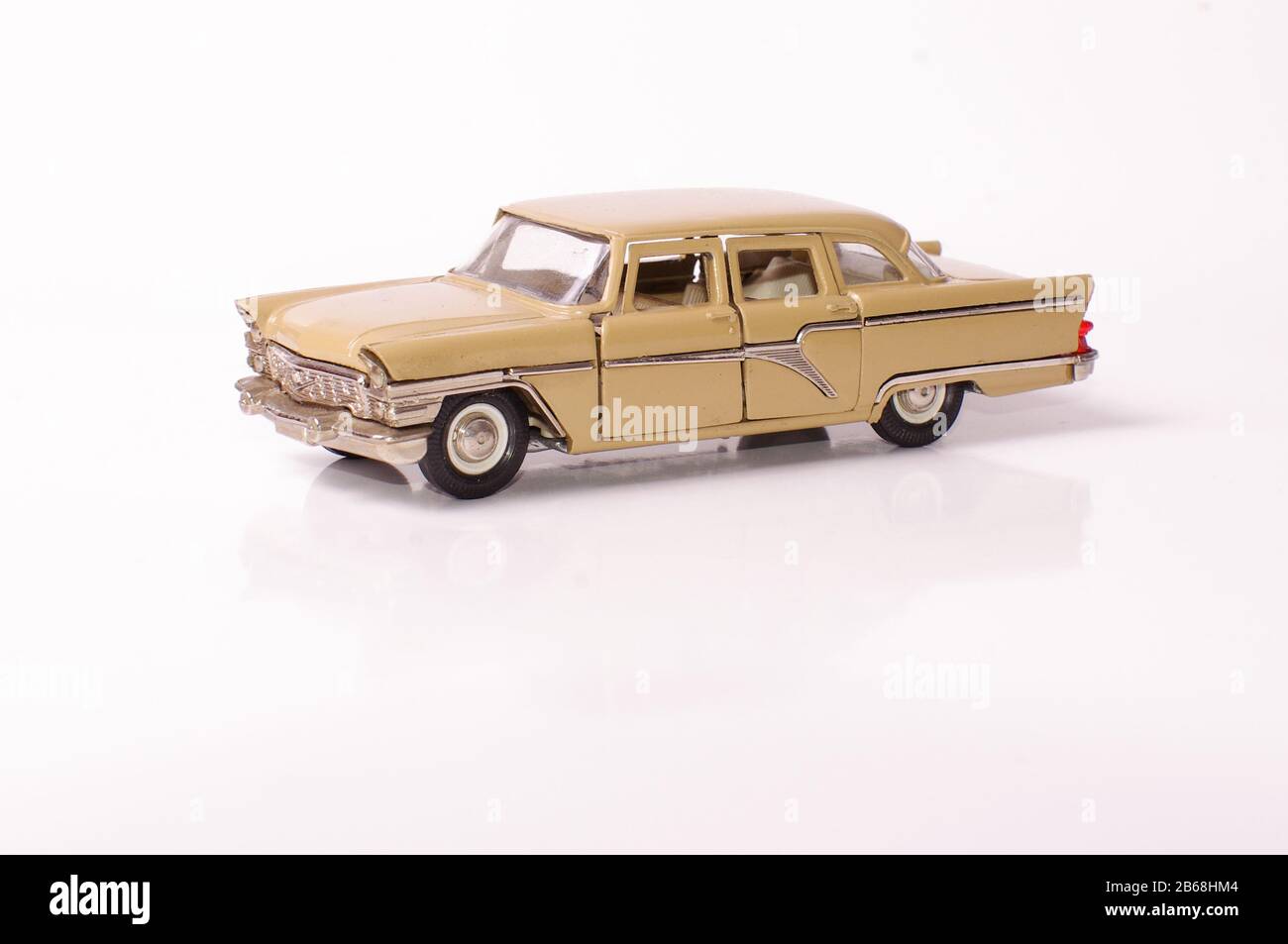 Old vintage metal die-cast car model isolated on the white background ...