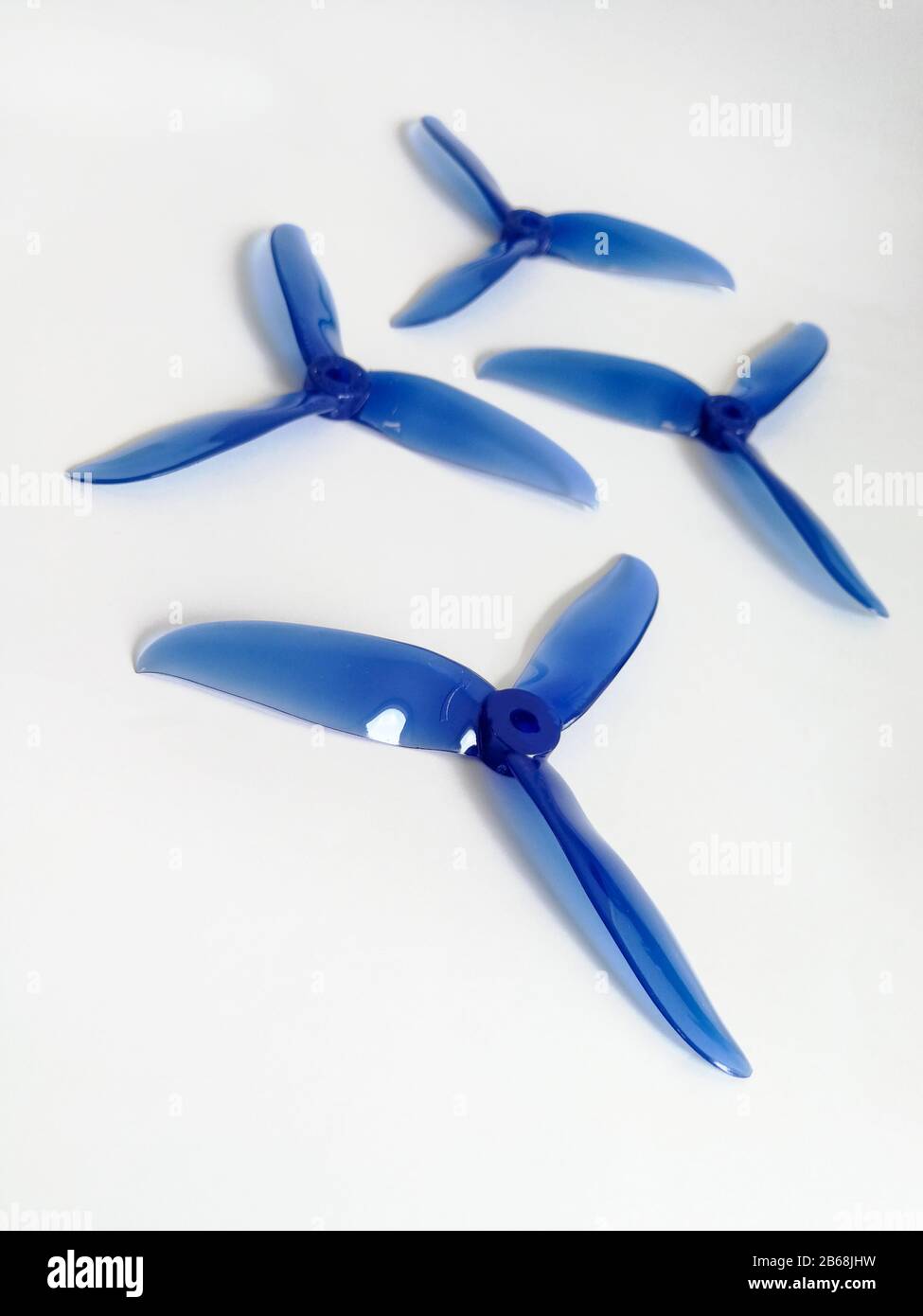 Plastic blue racing drone propeller on the white background Stock Photo ...