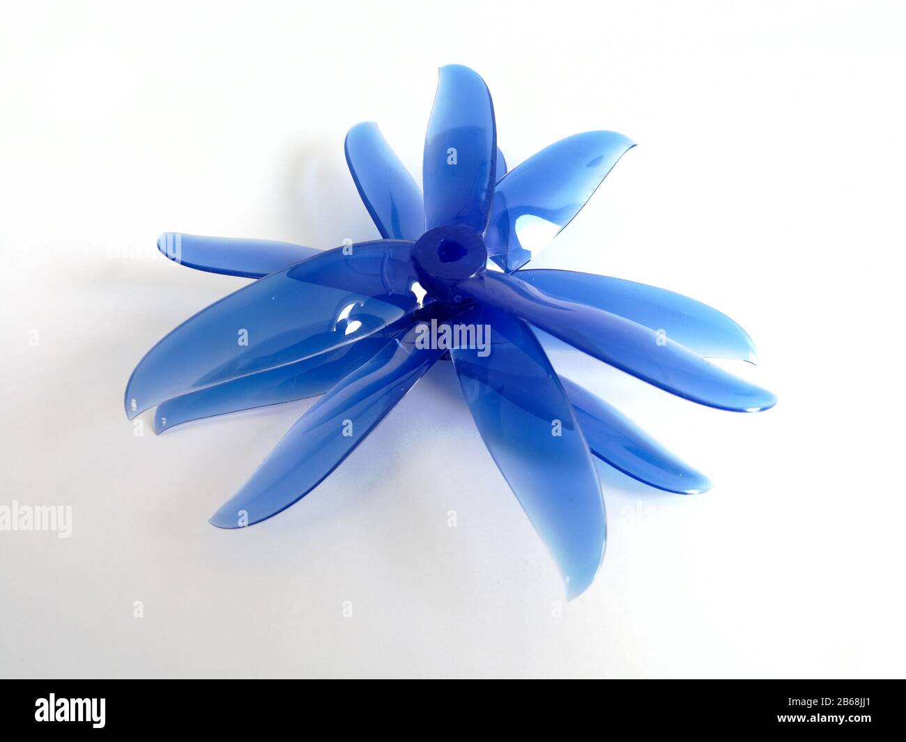 Plastic blue racing drone propeller on the white background Stock Photo ...