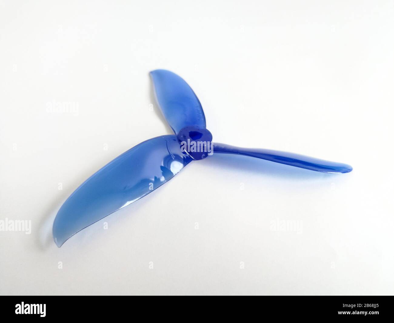 Plastic blue racing drone propeller on the white background Stock Photo ...