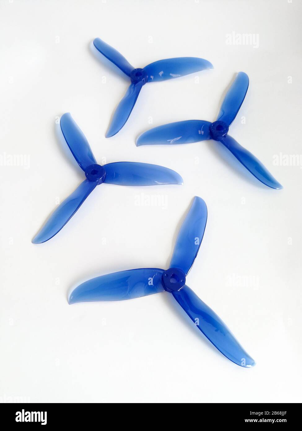 Plastic blue racing drone propeller on the white background Stock Photo ...
