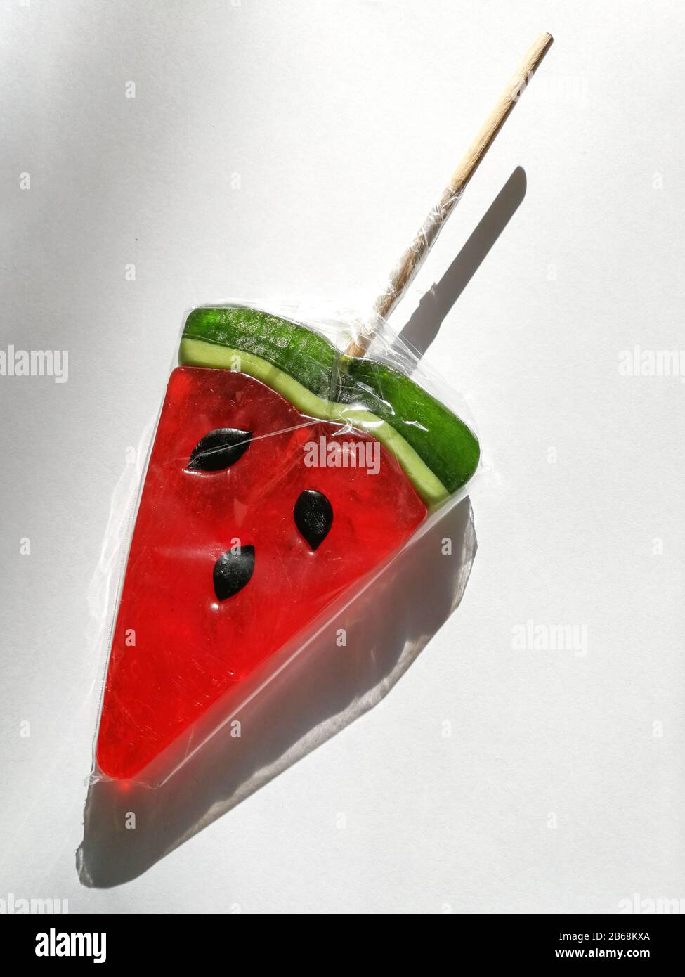 Watermelon shape lollipop candy handicraft from caramel Stock Photo - Alamy