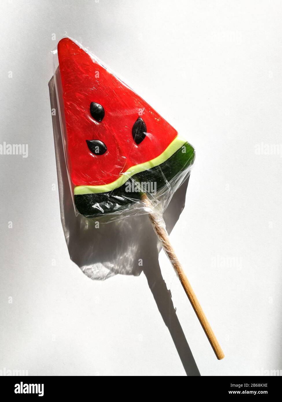 Watermelon shape lollipop candy handicraft from caramel Stock Photo - Alamy