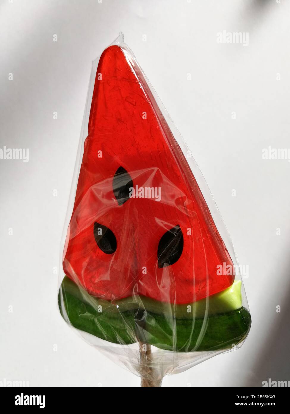 Watermelon shape lollipop candy handicraft from caramel Stock Photo - Alamy