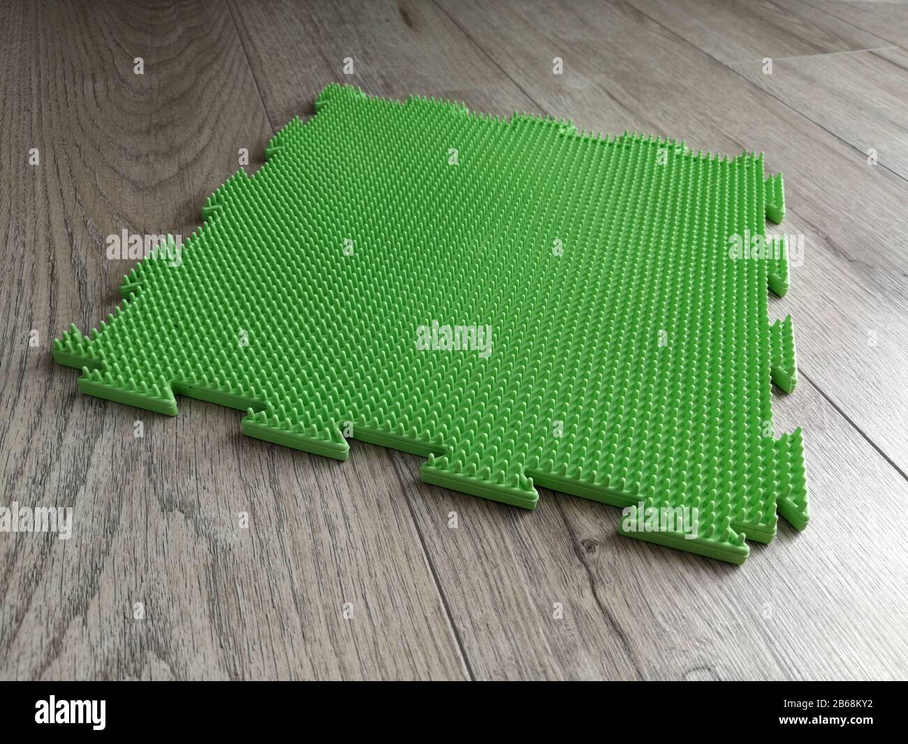 Orthopedic medical massage carpet for feet therapy Stock Photo - Alamy