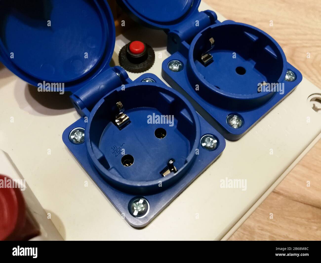 AC single phase power outlets with protection covers Stock Photo - Alamy