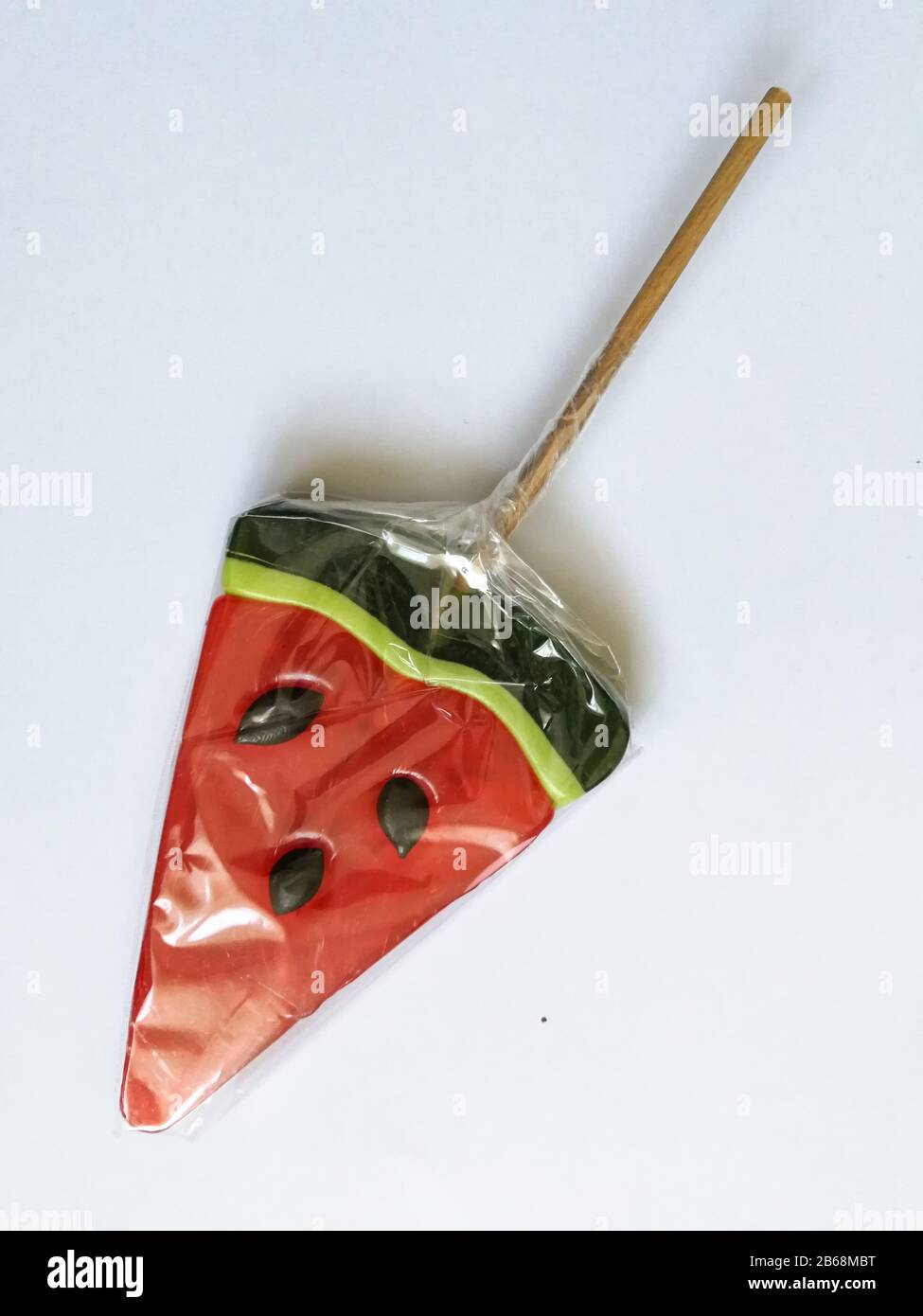 Watermelon shape lollipop candy handicraft from caramel Stock Photo - Alamy