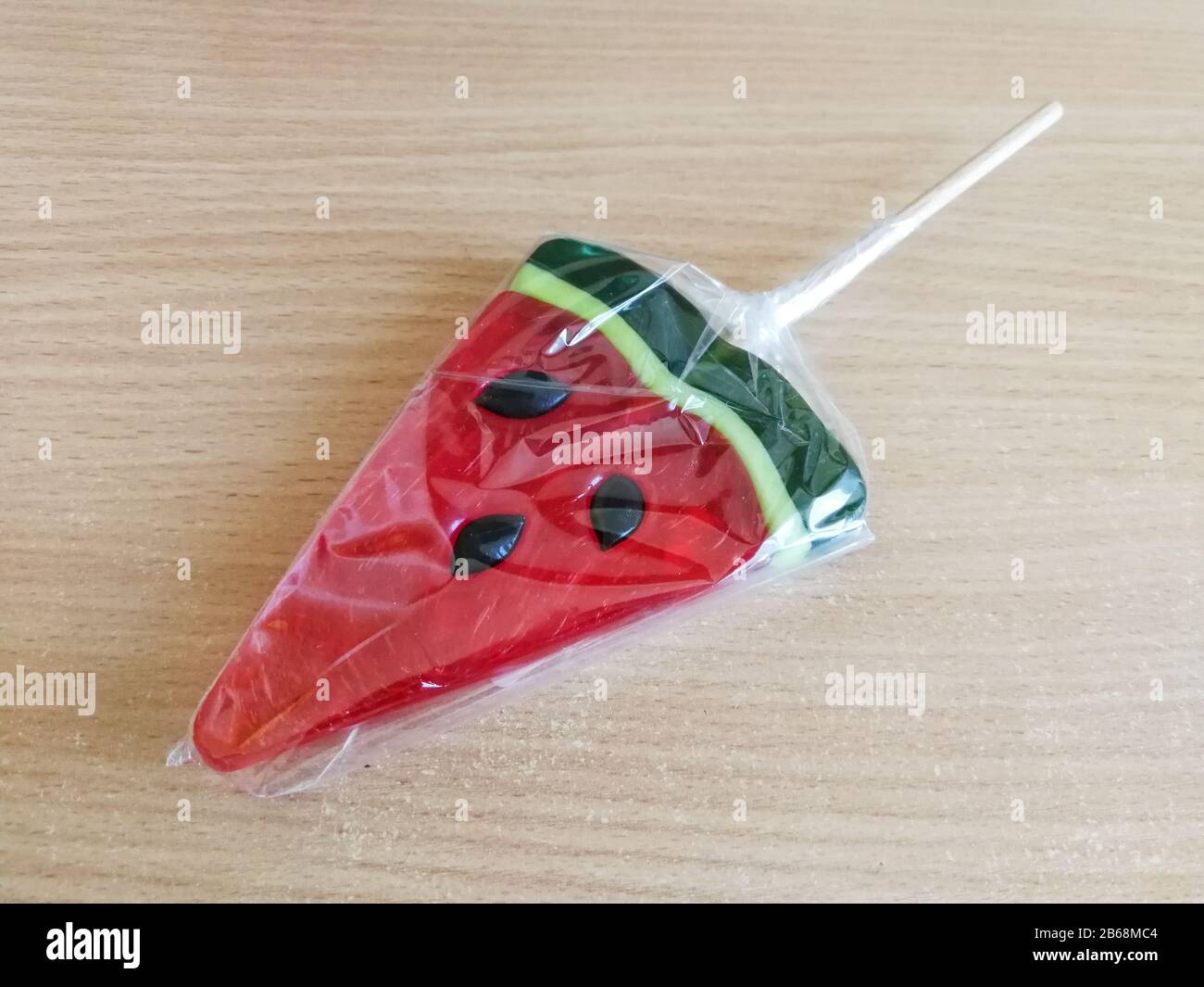 Watermelon shape lollipop candy handicraft from caramel Stock Photo - Alamy