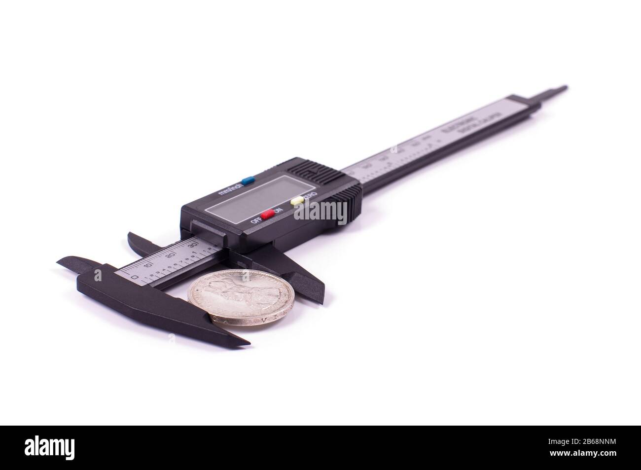 Precise measurement tool carbon fiber caliper isolated Stock Photo - Alamy