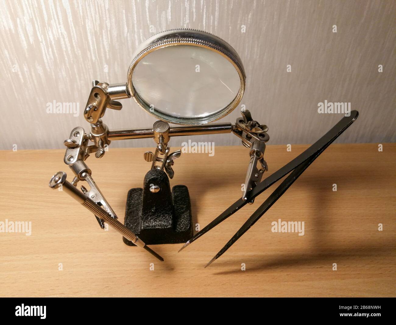 Special work tool holder holding tweezers and screwdriver Stock Photo ...