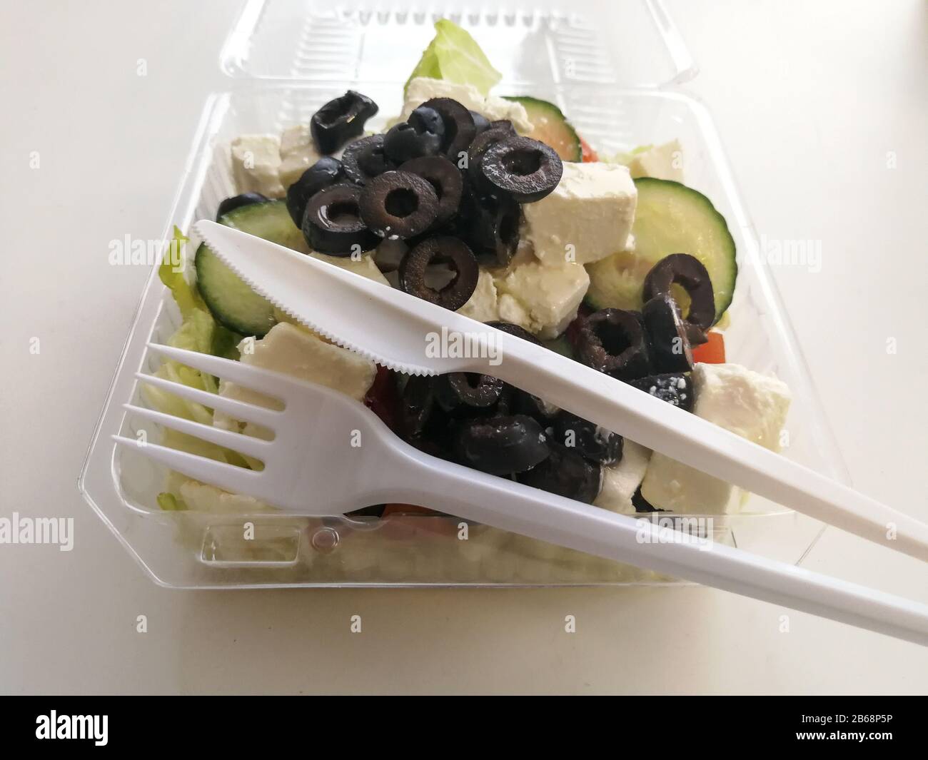 Healthy fast food Greek salad in plastic box for take away Stock Photo ...