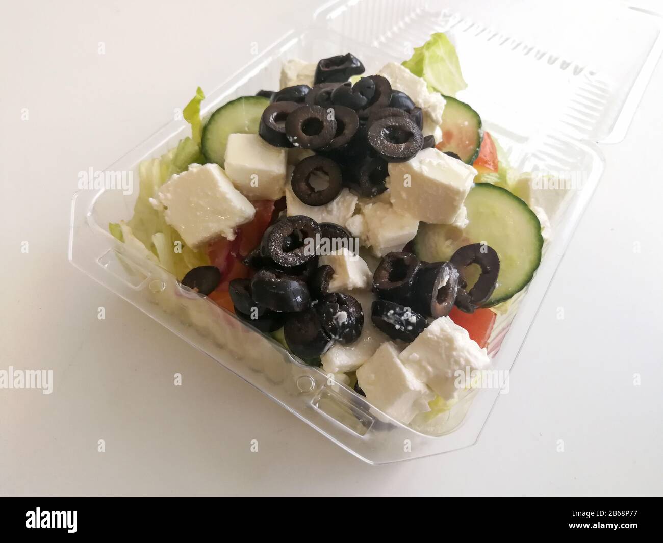 Healthy fast food Greek salad in plastic box for take away Stock Photo ...