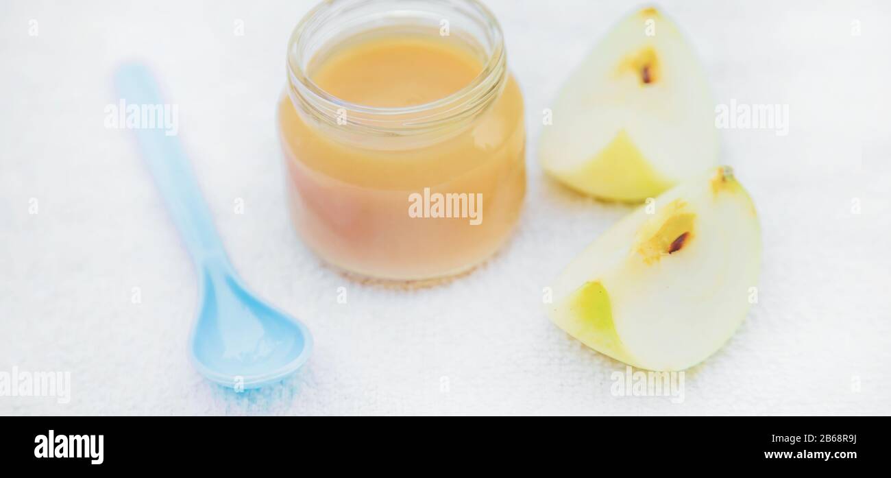 Baby food. Mashed vegetables and fruits in jars. Selective focus ...