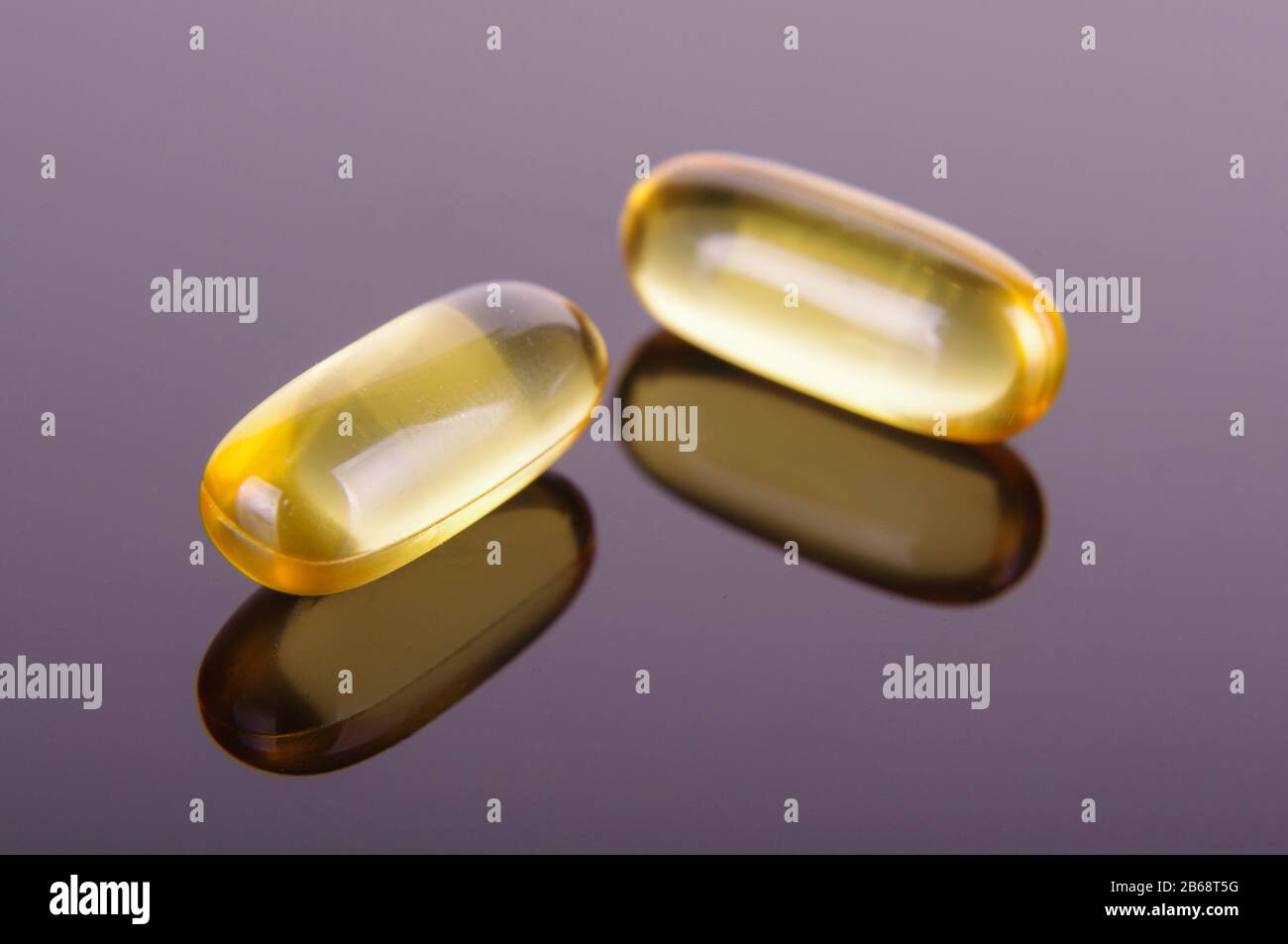 Macro close up of Omega 3 vitamin fatty acids capsules for healthy ...