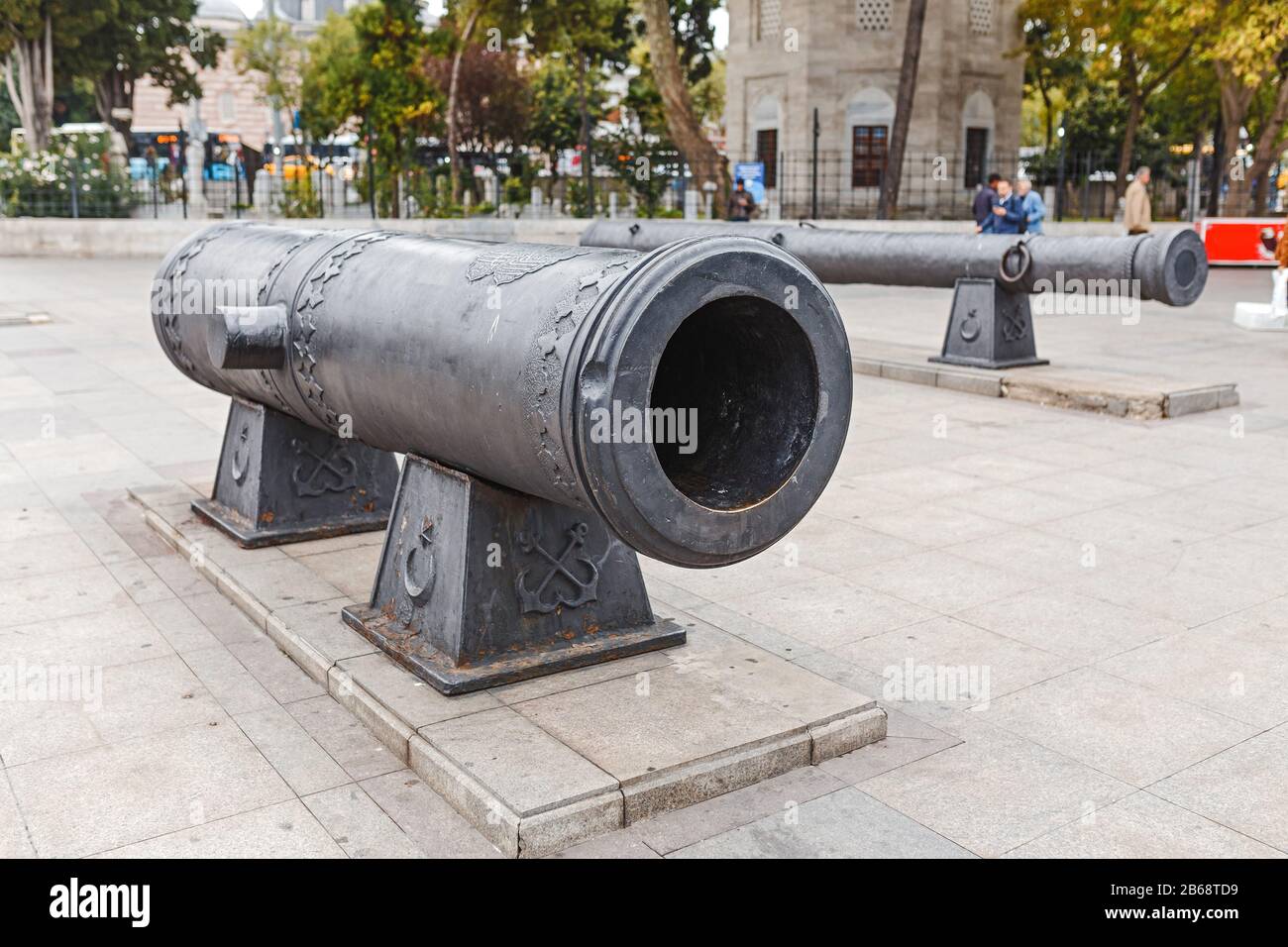 Two ancient sea cannons as exhibits near museum Stock Photo - Alamy